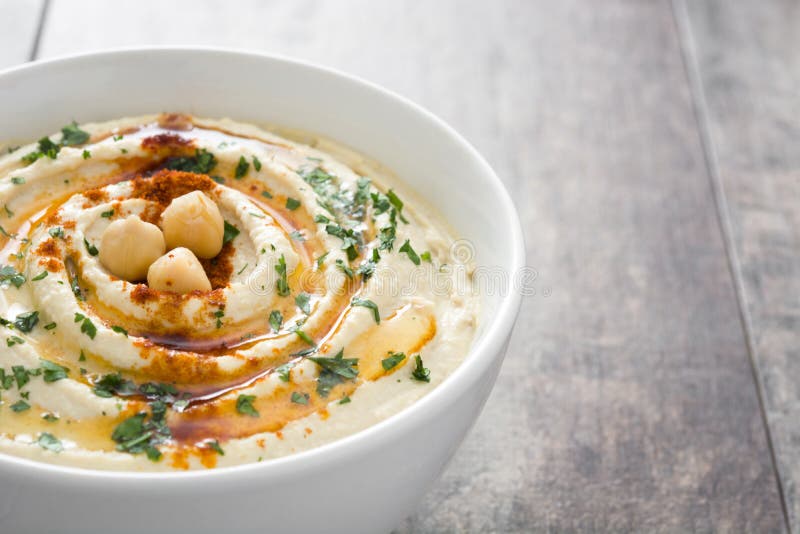 Hummus in Bowl on Rustic Wood Stock Image - Image of vegetarian, fresh ...