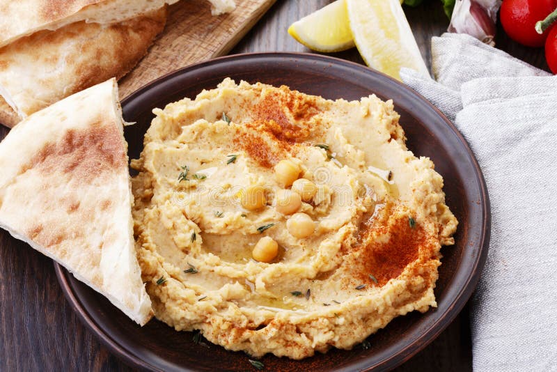 Hummus with flatbread stock photo. Image of vegan, paprika - 41149452