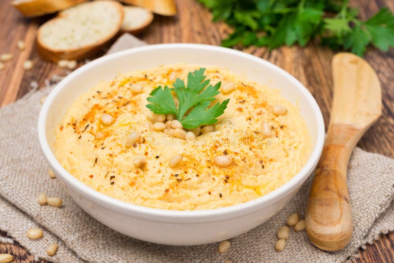Hummus with pine nuts stock photo. Image of spread, chickpea - 33470012