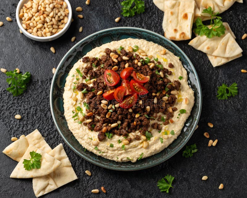 Hummus with Spiced Ground Beef, Olive Oil, Tomatoes and Toasted Pine ...