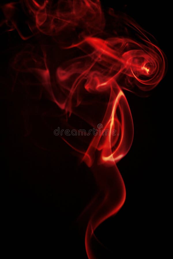 Humo rojo aislado en negro foto de archivo. Imagen de concepto - 7953480