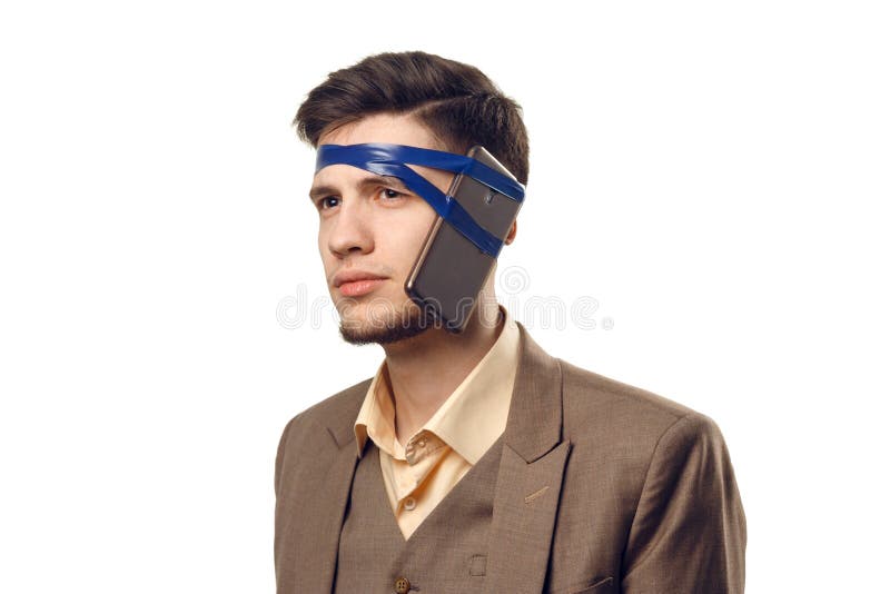 A Humorous Photo of Modern Technologies. Young Guy with a Phone ...