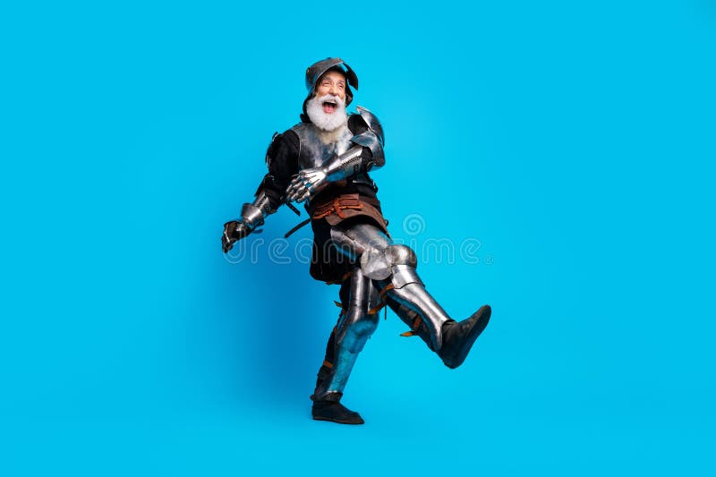 Senior Man in Medieval Knight Costume Posing Enthusiastically Against ...