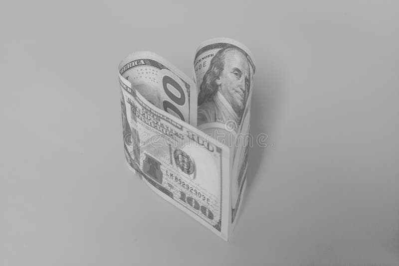 Hundred Dollar Bill in Heart Shape Stock Photo - Image of finance ...
