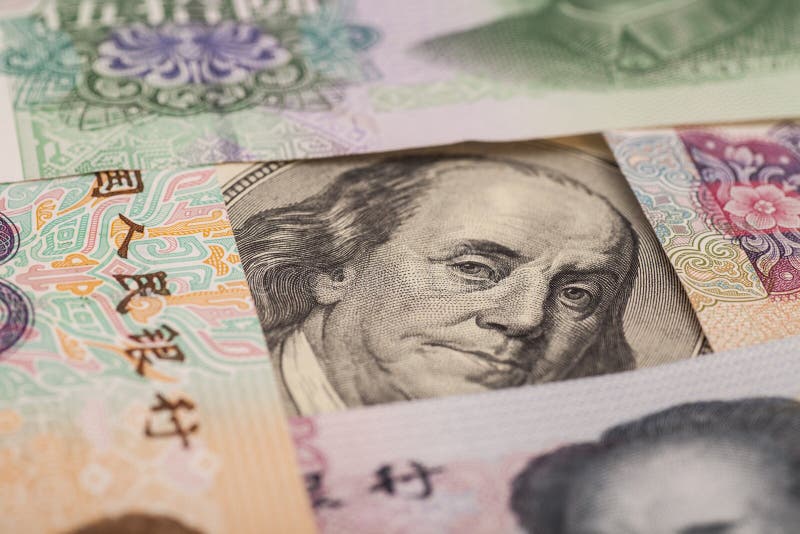 Hundred Dollar Bill Surrounded by Chinese Yuan Stock Image - Image of ...