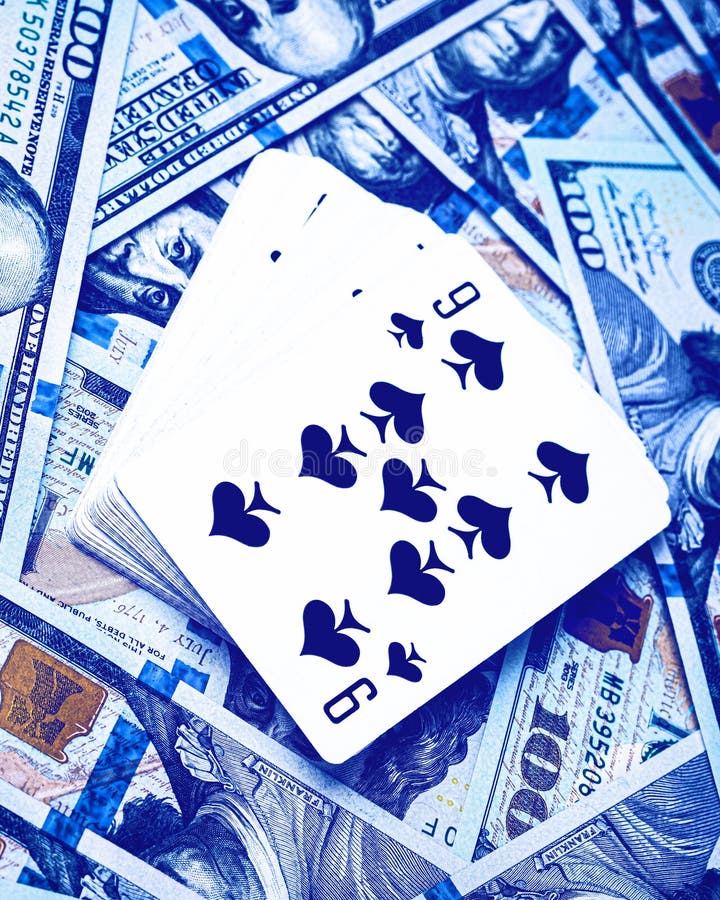 Hundred Dollar Bills and a Deck of Playing Cards. Stock Photo - Image ...
