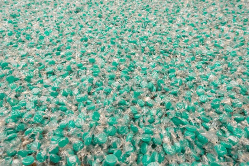Hundreds of Purple Mint Candies Stock Image - Image of glossy, green ...
