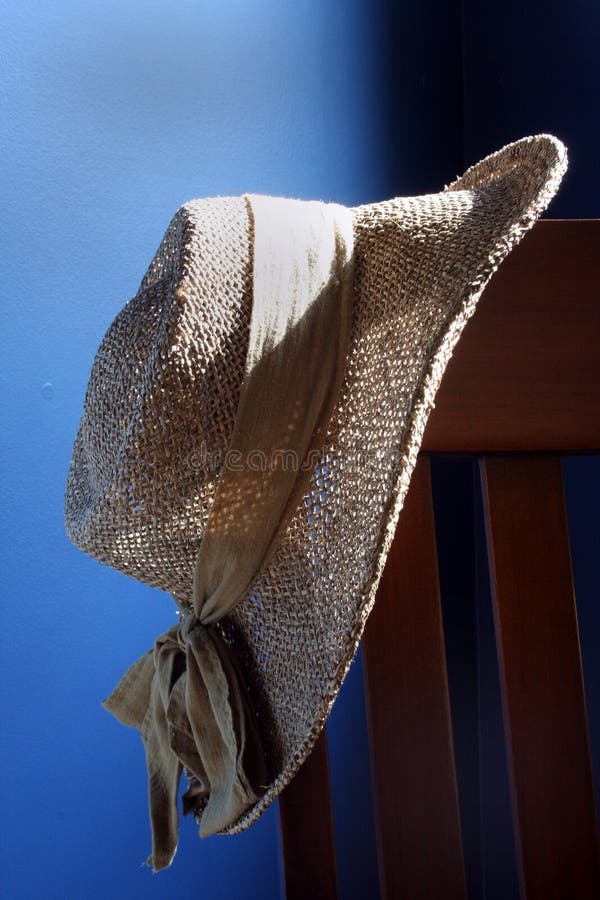 Amish Bonnet and Straw Hat Hanging on Wall Stock Photo - Image of hook ...
