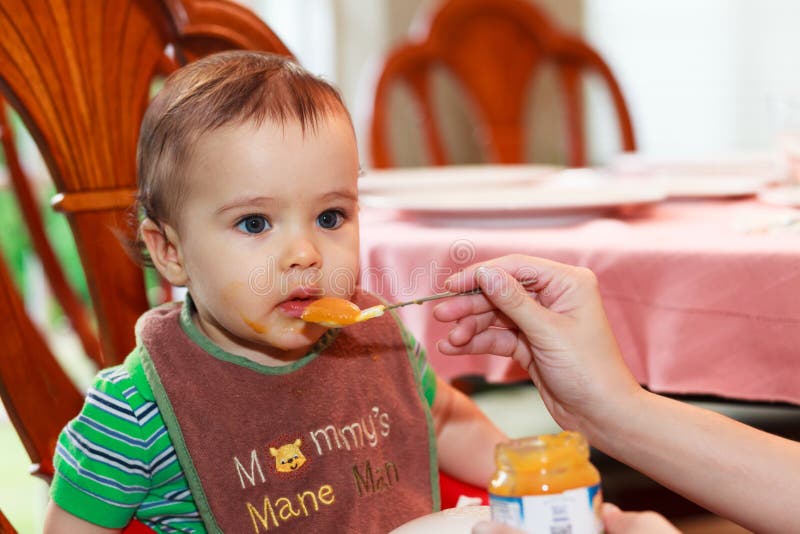 Hungry baby stock image. Image of mother, male, eating - 44256935
