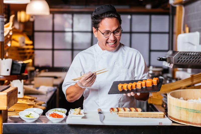 Hungry Chef is Looking at Yummy Roll Stock Image - Image of cuisine ...