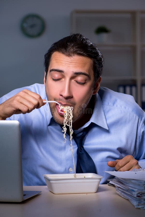 Hungry Employee Working Late in the Office Stock Image - Image of ...