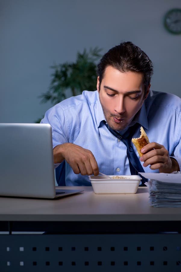 Hungry Employee Working Late in the Office Stock Photo - Image of boss ...
