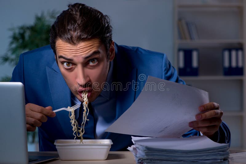 Hungry Employee Working Late in the Office Stock Photo - Image of boss ...