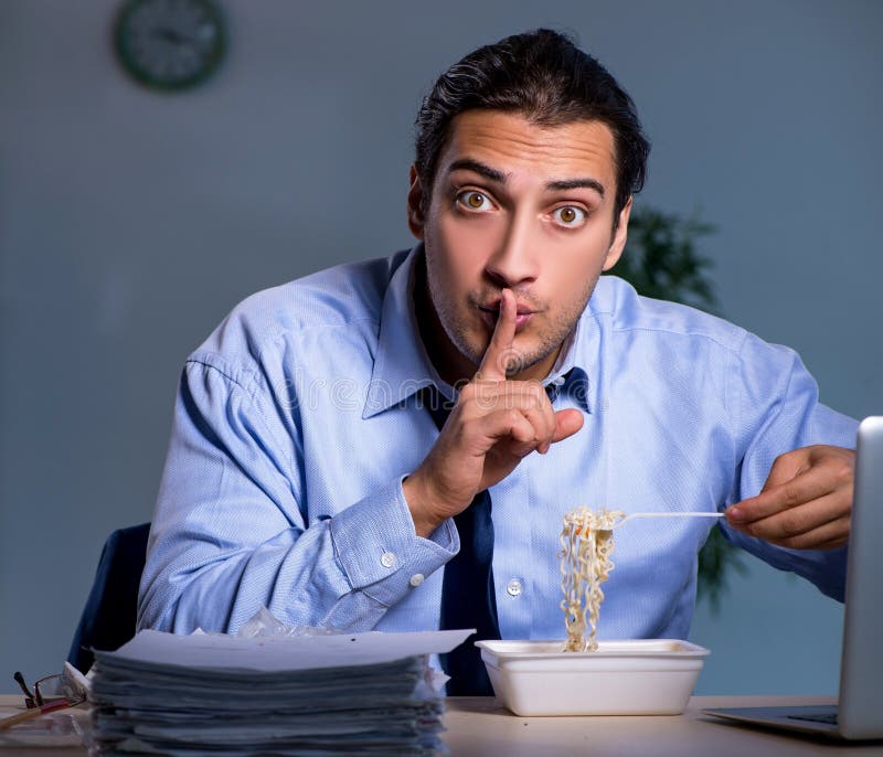 Hungry Employee Working Late in the Office Stock Image - Image of ...