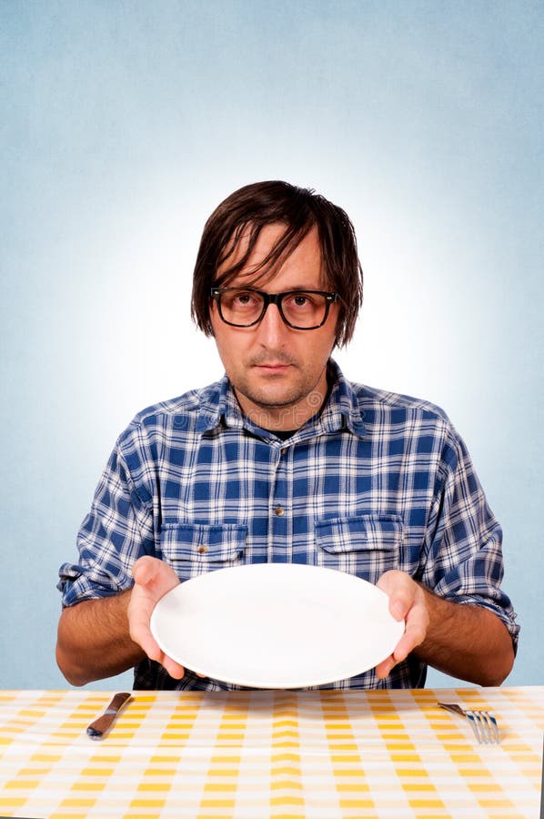 A hungry man stock photo. Image of silverware, dishware - 27562664