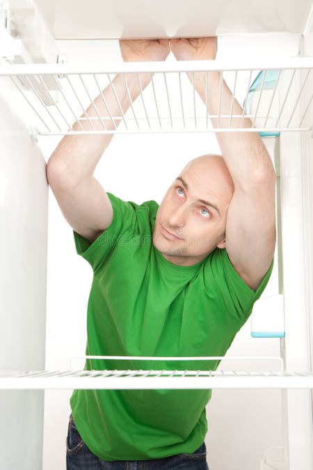 Hungry man in fridge stock photo. Image of fridge, appetite - 18965588