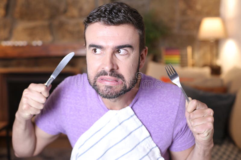Hungry Man Holding Fork and Knife Stock Photo - Image of hand, meal ...