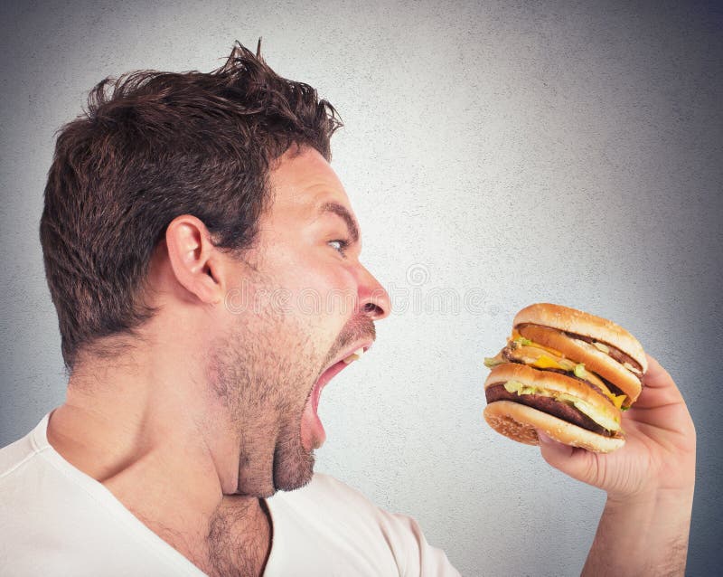Hungry man stock photo. Image of hamburger, obese, grease - 51555546