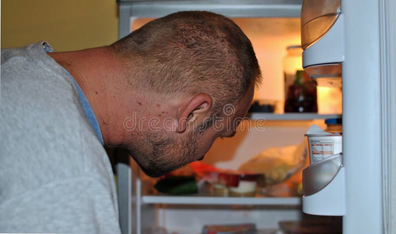Hungry man stock photo. Image of eating, food, fridge - 46641628