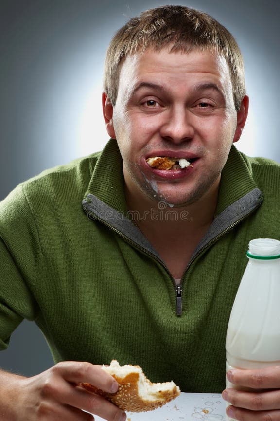 Hungry Man with Mouth Full of Bread Stock Photo - Image of face, human ...