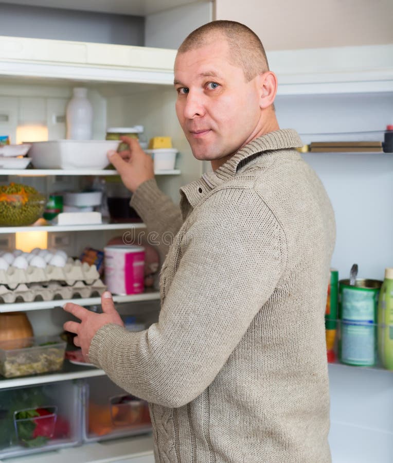 Hungry Man and Refrigerator Stock Photo - Image of person, male: 59272162