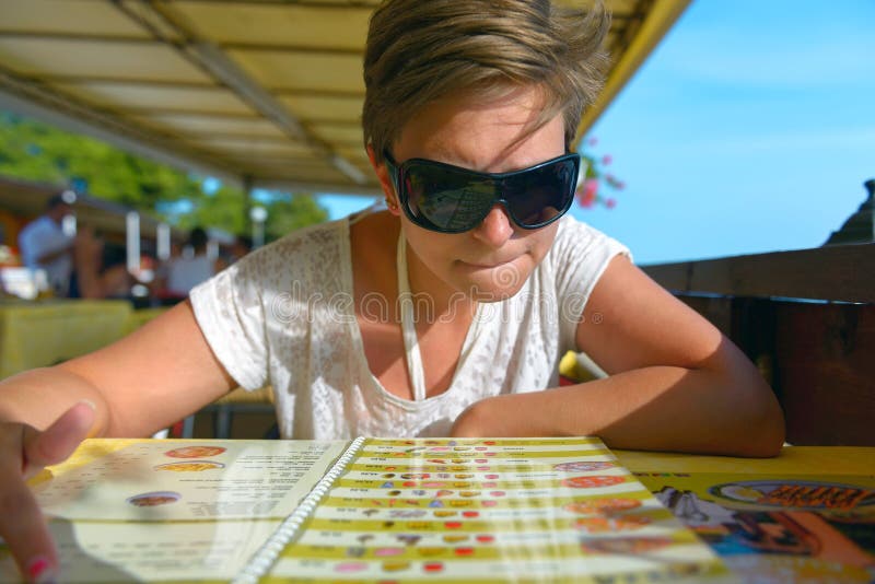 Hungry Woman Looking into the Menu Stock Photo - Image of question ...
