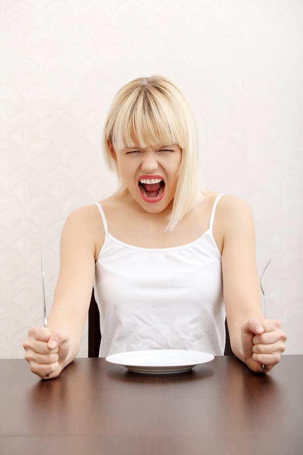 Hungry woman s screaming. stock image. Image of food - 18753397