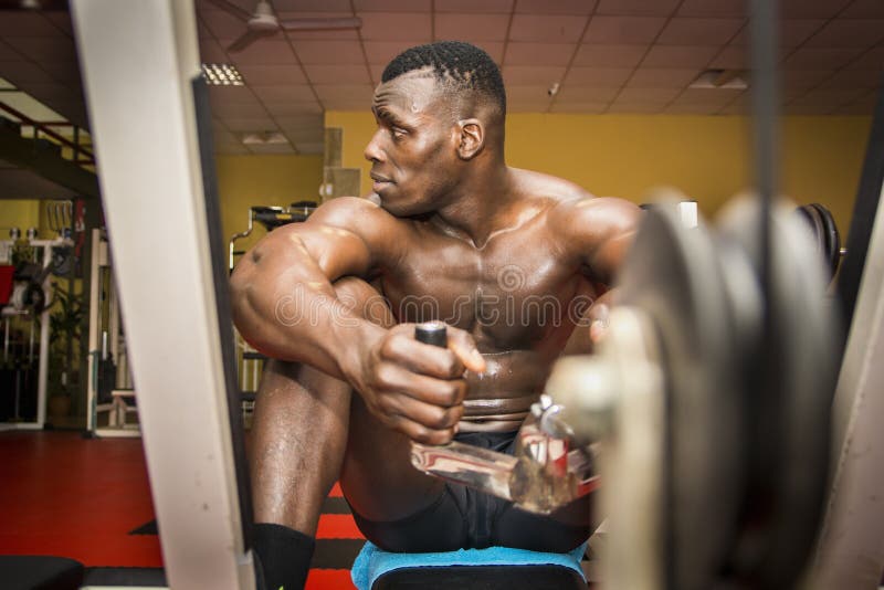 Back of Hunky Black Male Bodybuilder in Gym Stock Photo - Image of ...