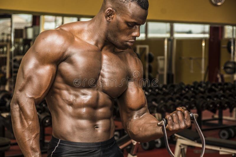 Hunky Muscular Black Bodybuilder Working Out in Stock Image - Image of ...