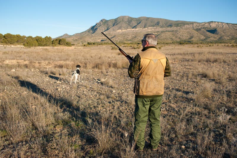 Hunter with His Dog in the Early Morning Stock Photo - Image of ...