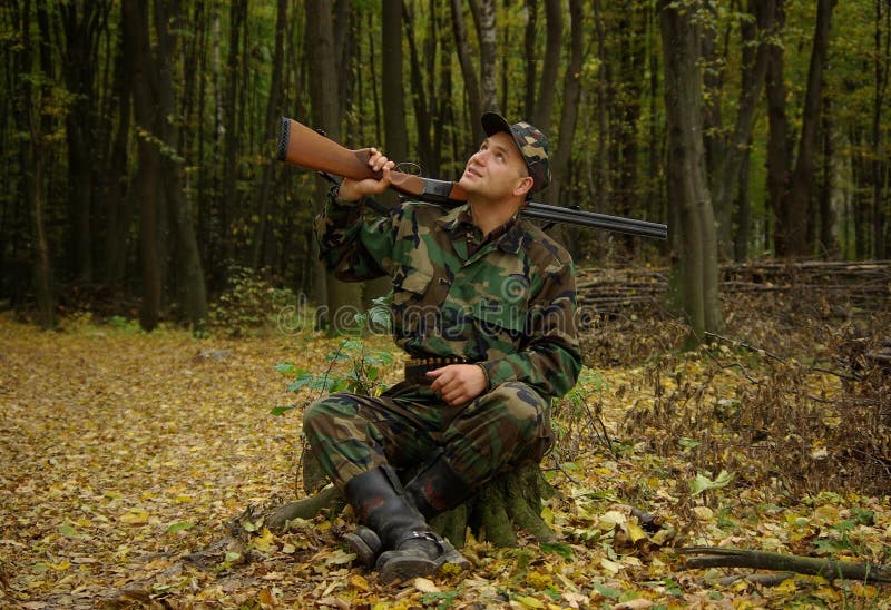 Russian Hunter stock photo. Image of deer, pointing, leaves - 26466866