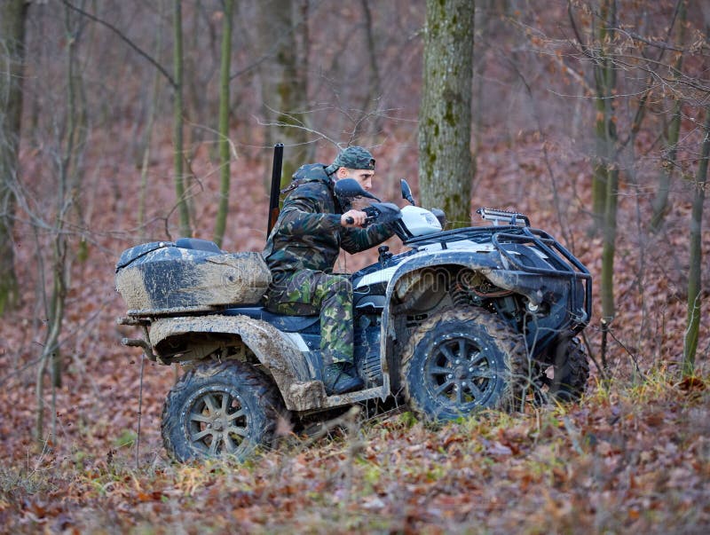 Hunter on ATV in the Forest Stock Photo - Image of nature, hunt: 106912516