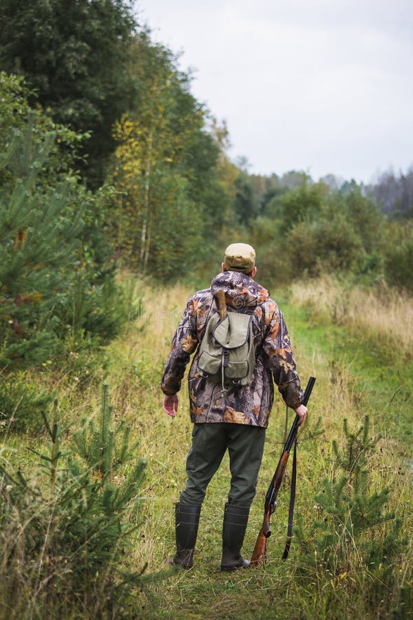 Hunter in the Autumn Forest. Stock Photo - Image of piece, trees: 100246476