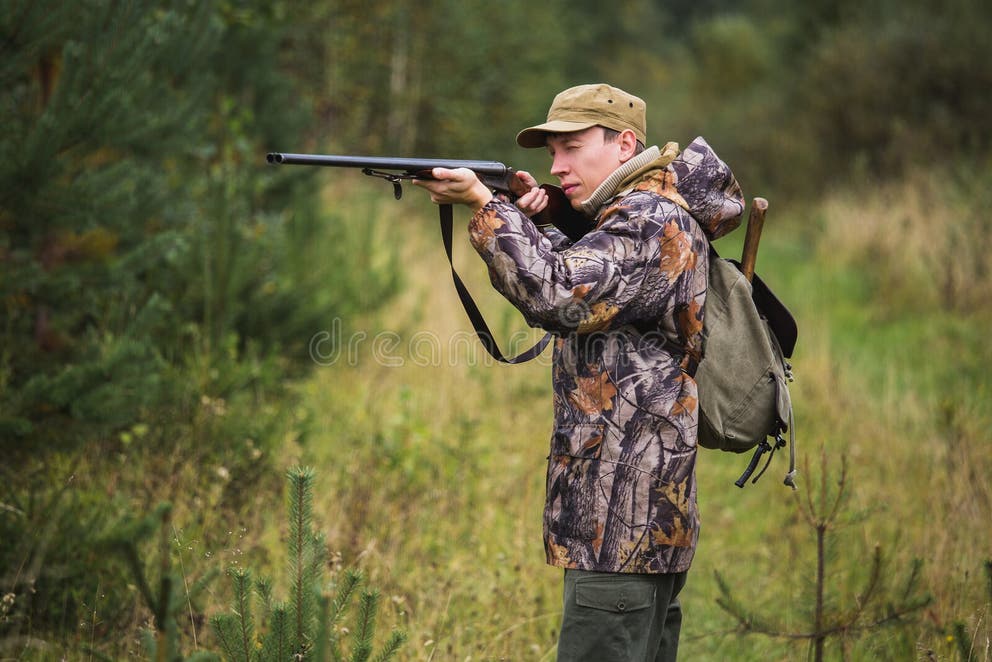 Hunter in the Autumn Forest. Stock Photo - Image of trees, fowling ...