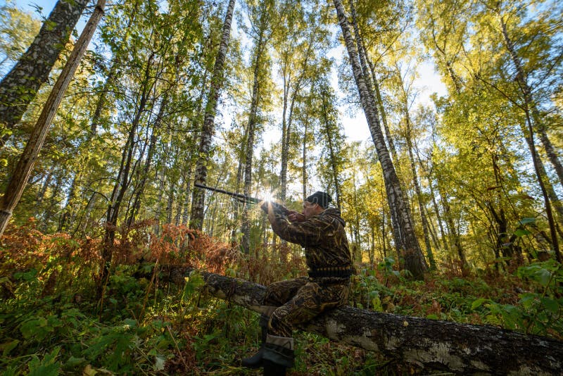 Hunter in the Autumn Forest. Stock Photo - Image of landscape, deer ...
