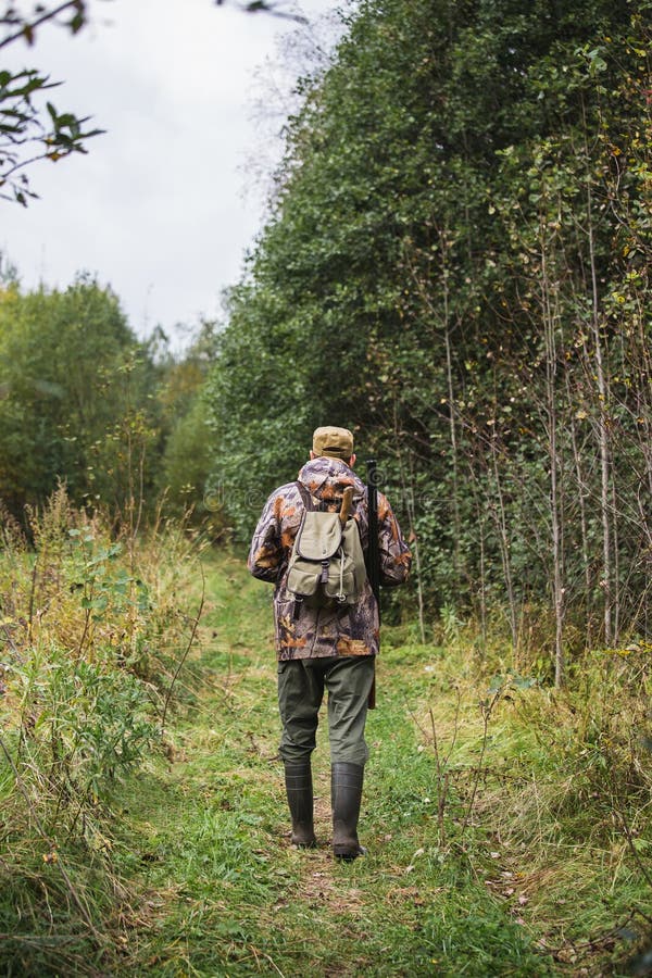 Hunter in the Autumn Forest. Stock Photo - Image of barrel, weapon ...