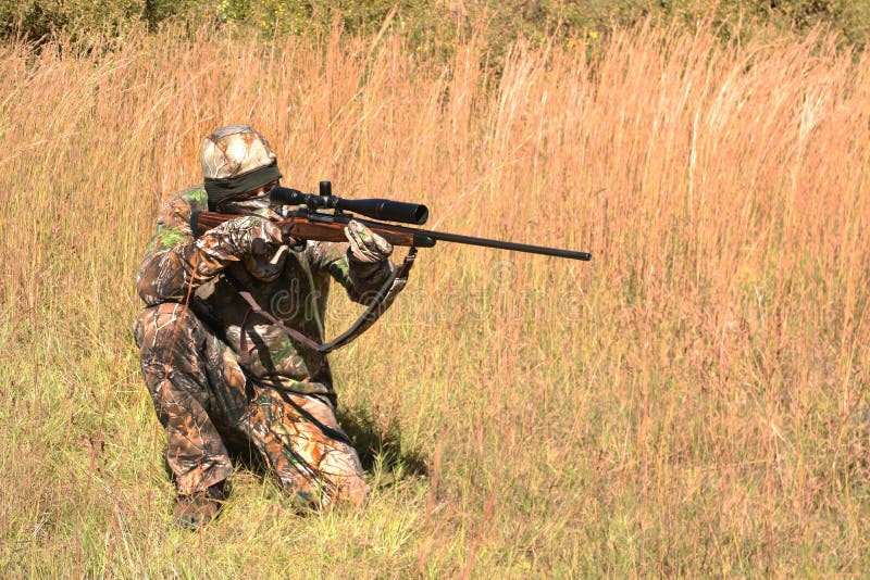 Hunter in Camo stock photo. Image of scope, rifle, passion - 79244778