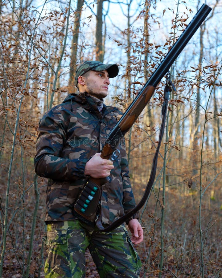 Hunter with shotgun stock image. Image of outdoors, forest - 106945621