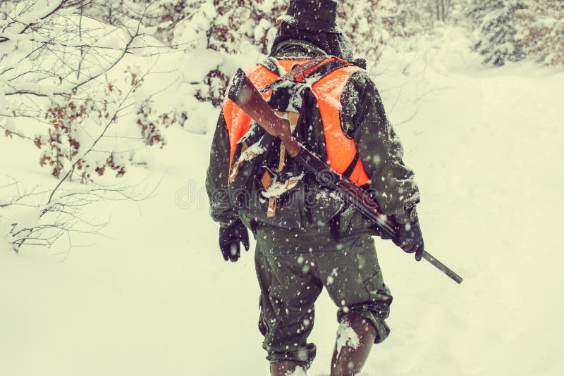Hunter in Camouflage with Shotgun on the Winter Hunting Stock Image ...