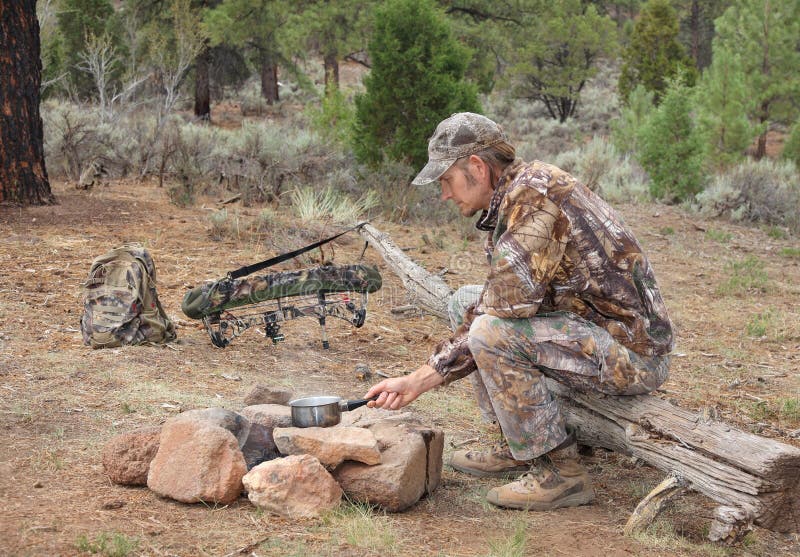 Hunter Cooking Over Open Camp Fire Stock Photo - Image of fire ...