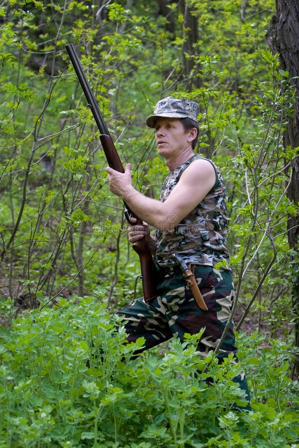 Hunter in Forest with Gun in Hands Stock Photo - Image of activity ...