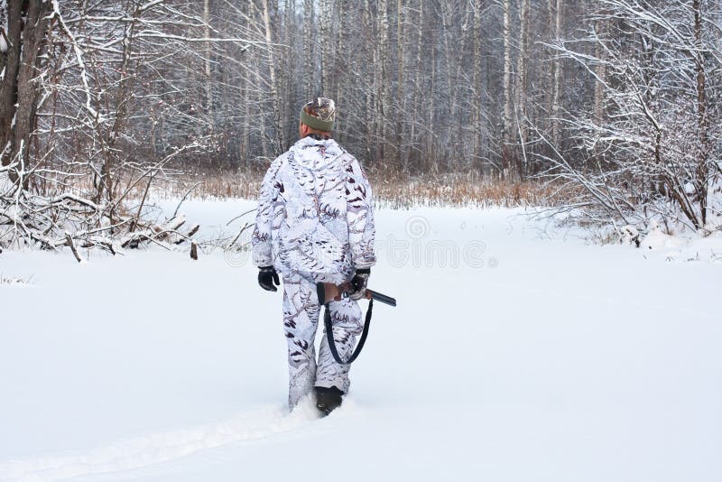 Hunter is on a Frozen River Stock Image - Image of snow, male: 126230249
