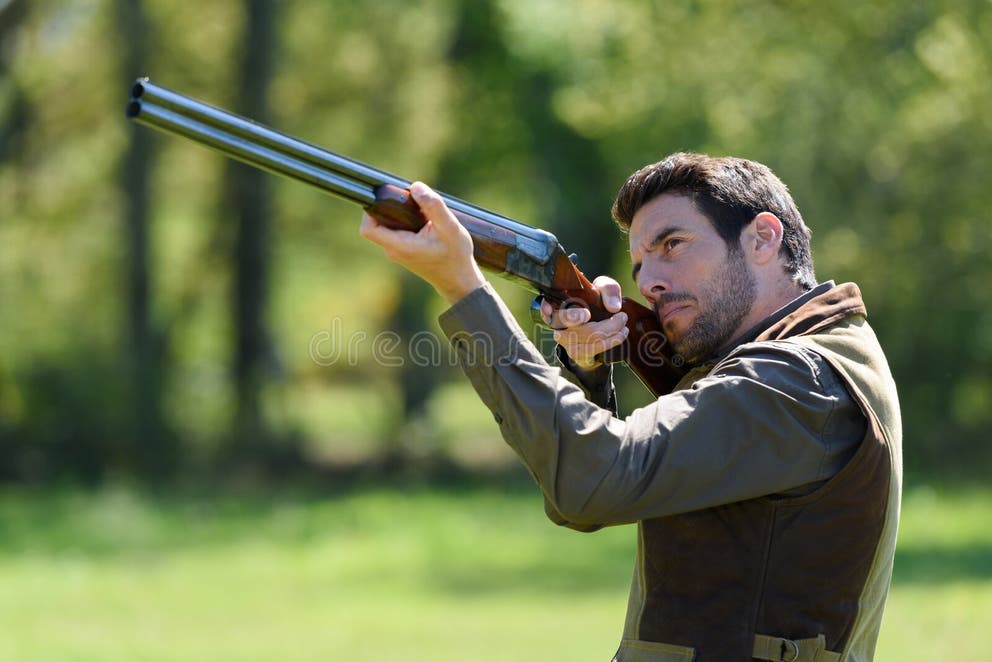 Hunter with Gun Aiming at Something Stock Image - Image of insurance ...