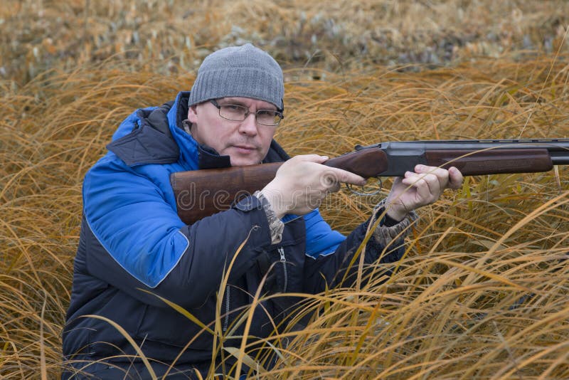 Hunter with a Gun . Autumn Duck Hunting Stock Photo - Image of grass ...