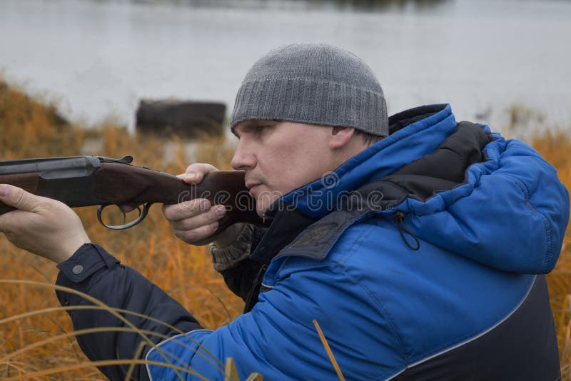 Hunter with a Gun . Autumn Duck Hunting Stock Photo - Image of field ...