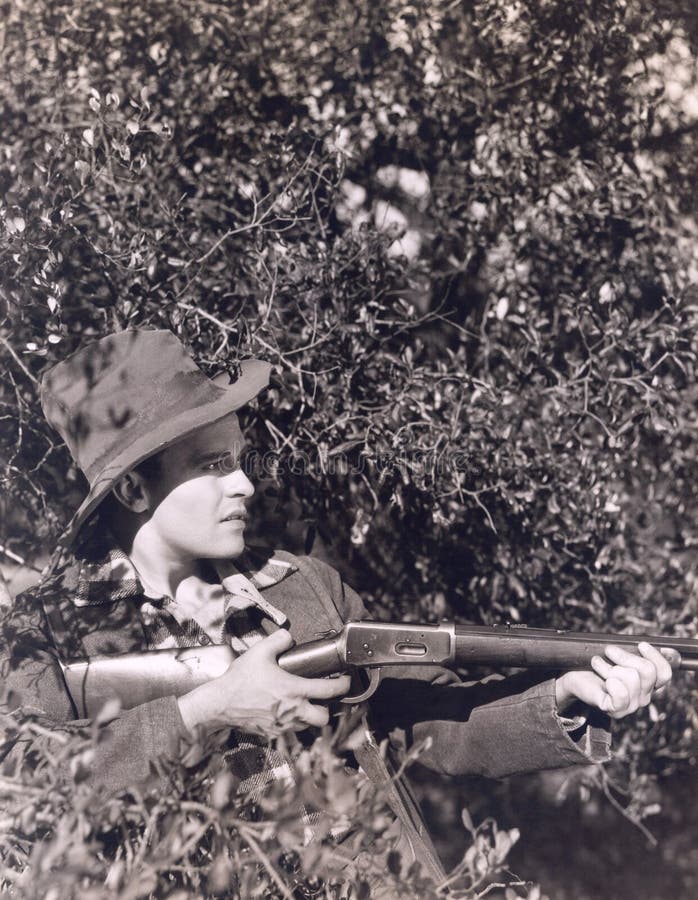 Hunter Hiding in the Bushes Stock Image - Image of nostalgia, male ...
