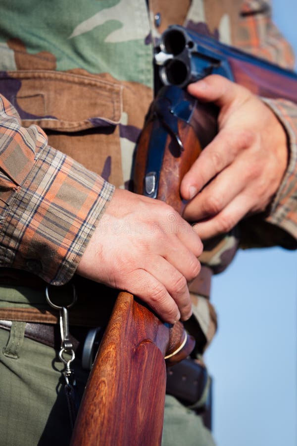 Hunter holding a crossbow stock image. Image of male - 33804229