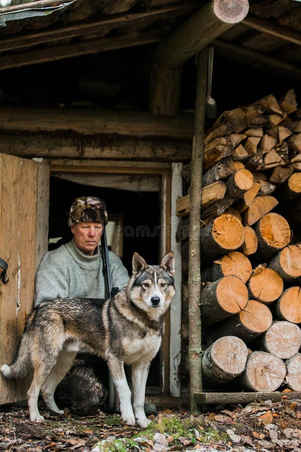 Hunter with a hunting dog stock image. Image of camp - 94461793