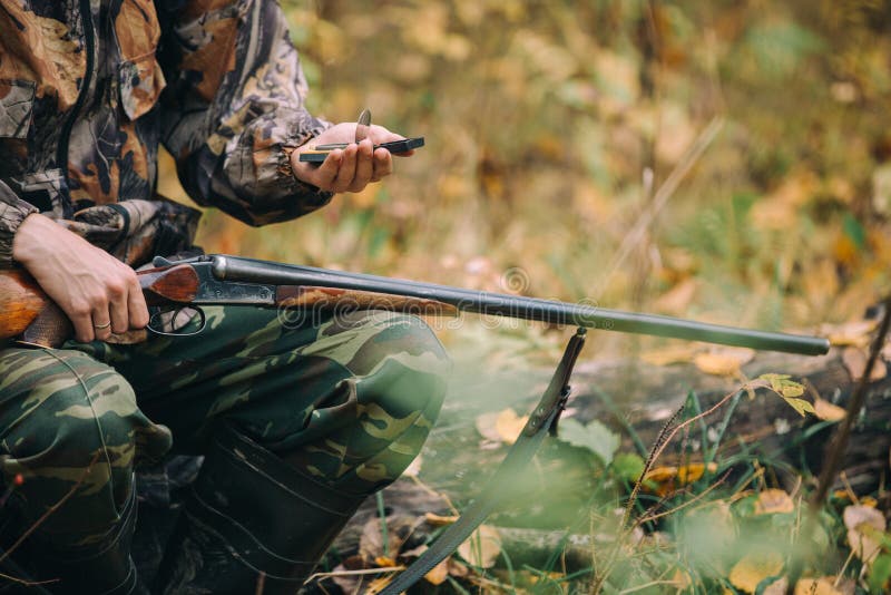 Hunter with hunting rifle stock image. Image of forest - 94363265