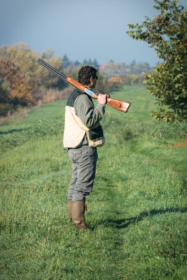 Hunter hunting stock image. Image of male, analyzing - 69817635